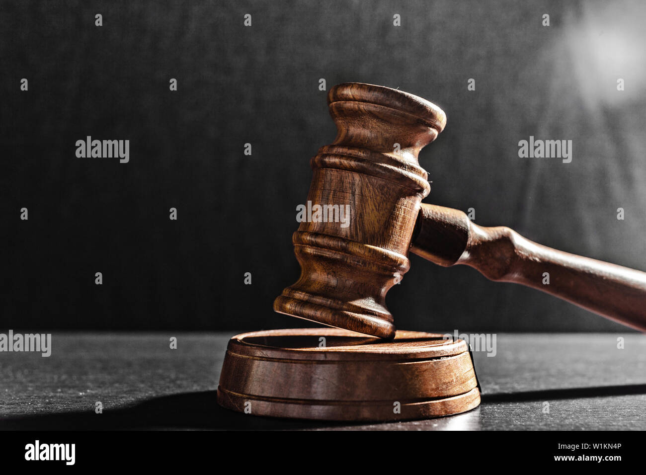 Judge's Gavel over black background Stock Photo - Alamy