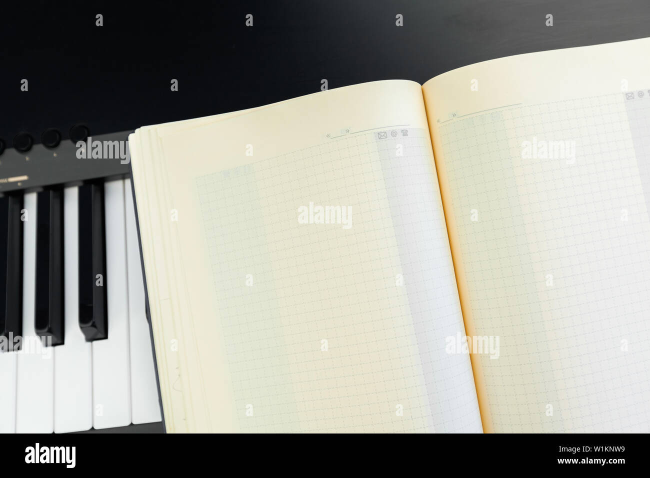 piano keys and notepad Stock Photo - Alamy