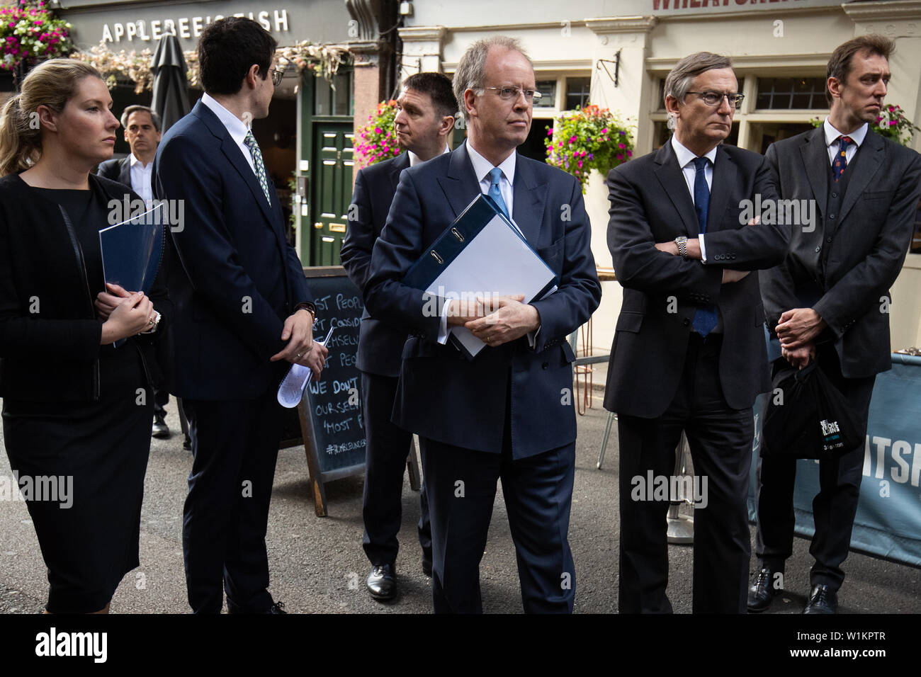 Chief Coroner Mark Lucraft QC (centre) and Counsel for the Metropolitan ...