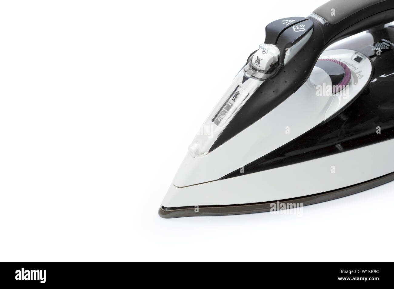 Iron isolated on a white background Stock Photo - Alamy