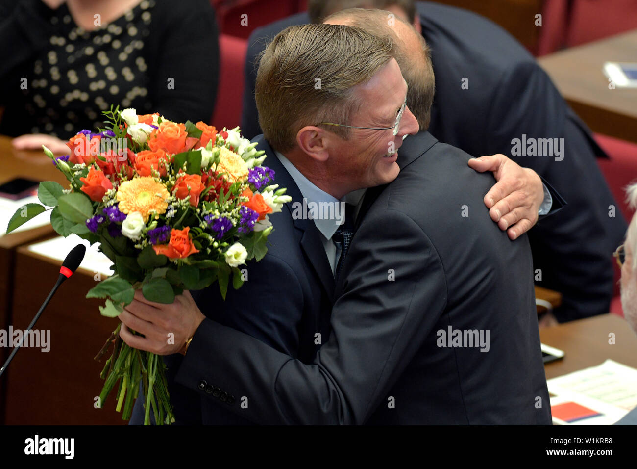 Bremen, Germany. 03rd July, 2019. A Member of Parliament congratulates ...