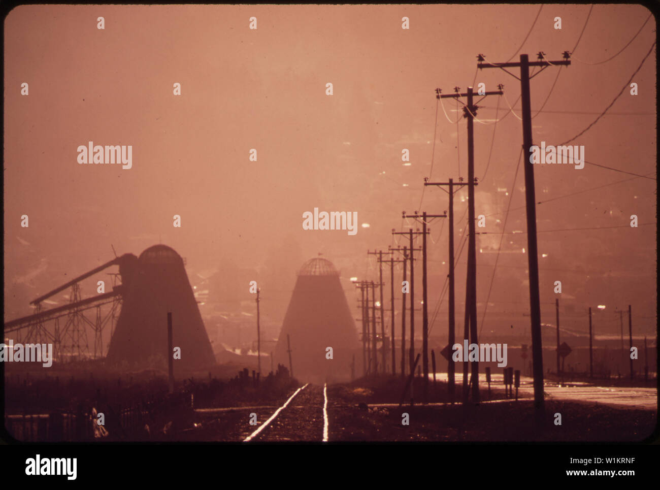 WOOD CHIP BURNERS IN SMOG Stock Photo - Alamy