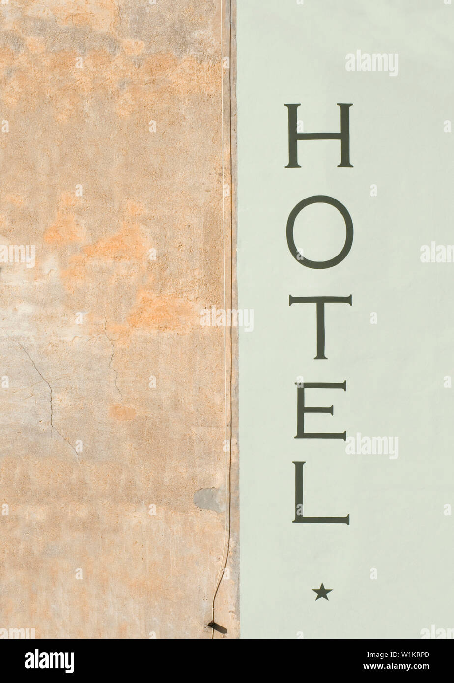 Hotel sign on wall Stock Photo - Alamy