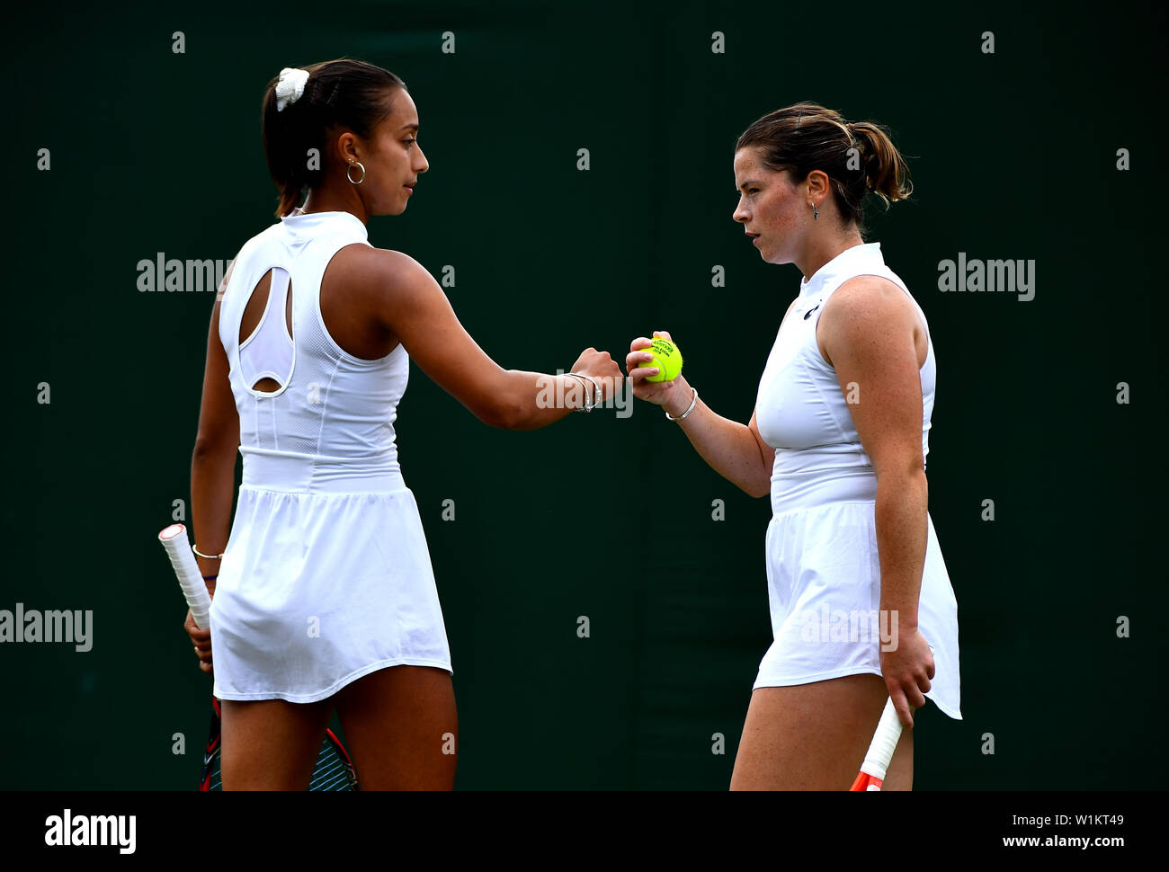 Sarah Beth Grey (right) and Eden Silva during the women's doubles on ...