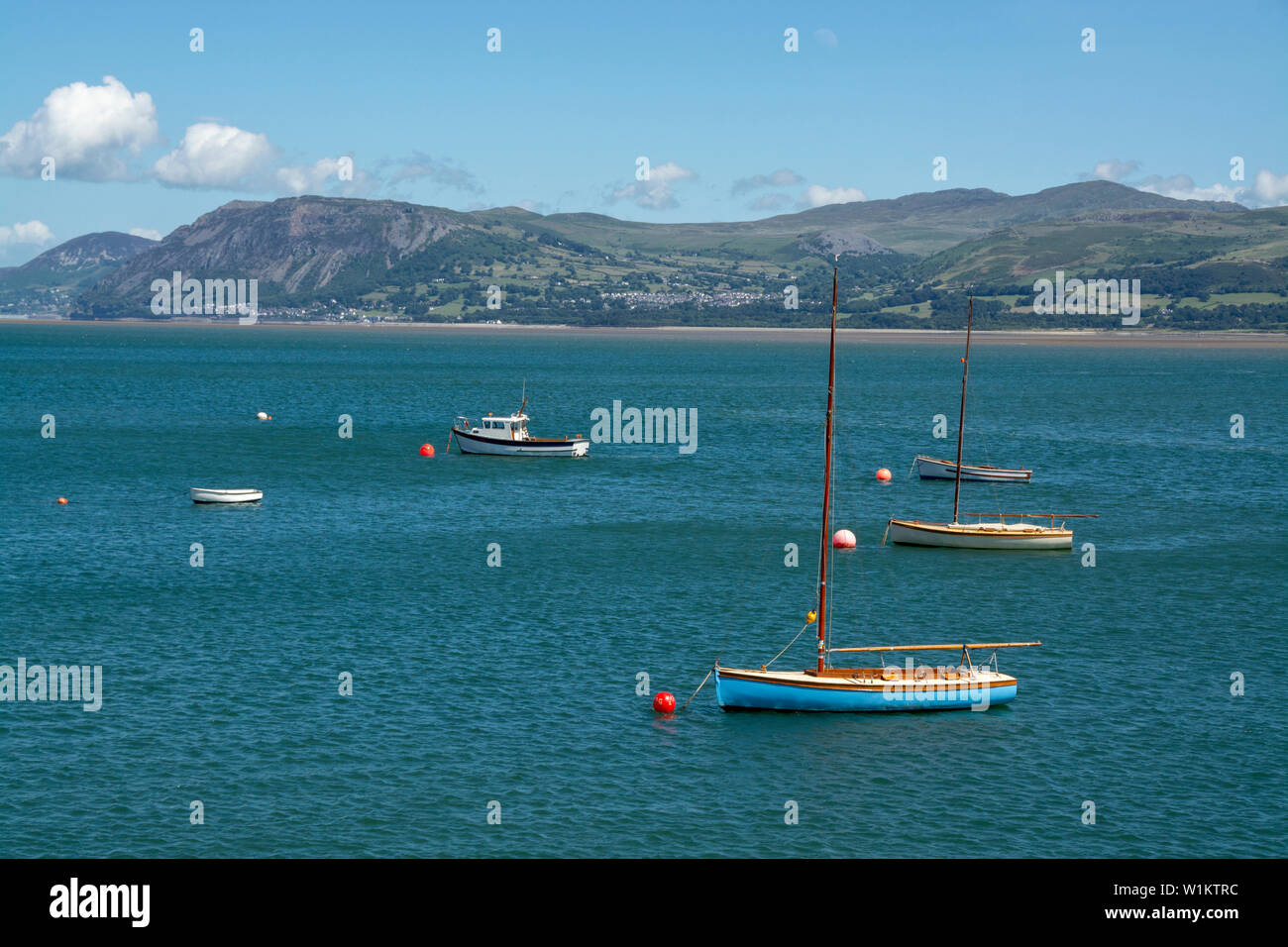 Boats in the Menai Strait and Snowdonia in the background - 2 Stock ...