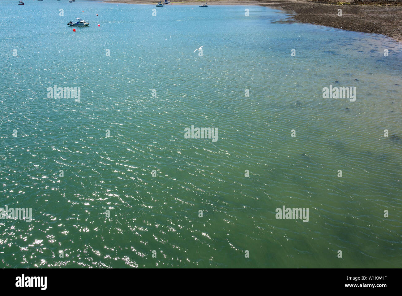 Clear water of Menai Strait seen from a pier of Anglesey island Stock ...