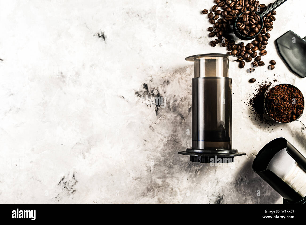 Coffee concept - beans, ground, instant, capsules, marble background ...