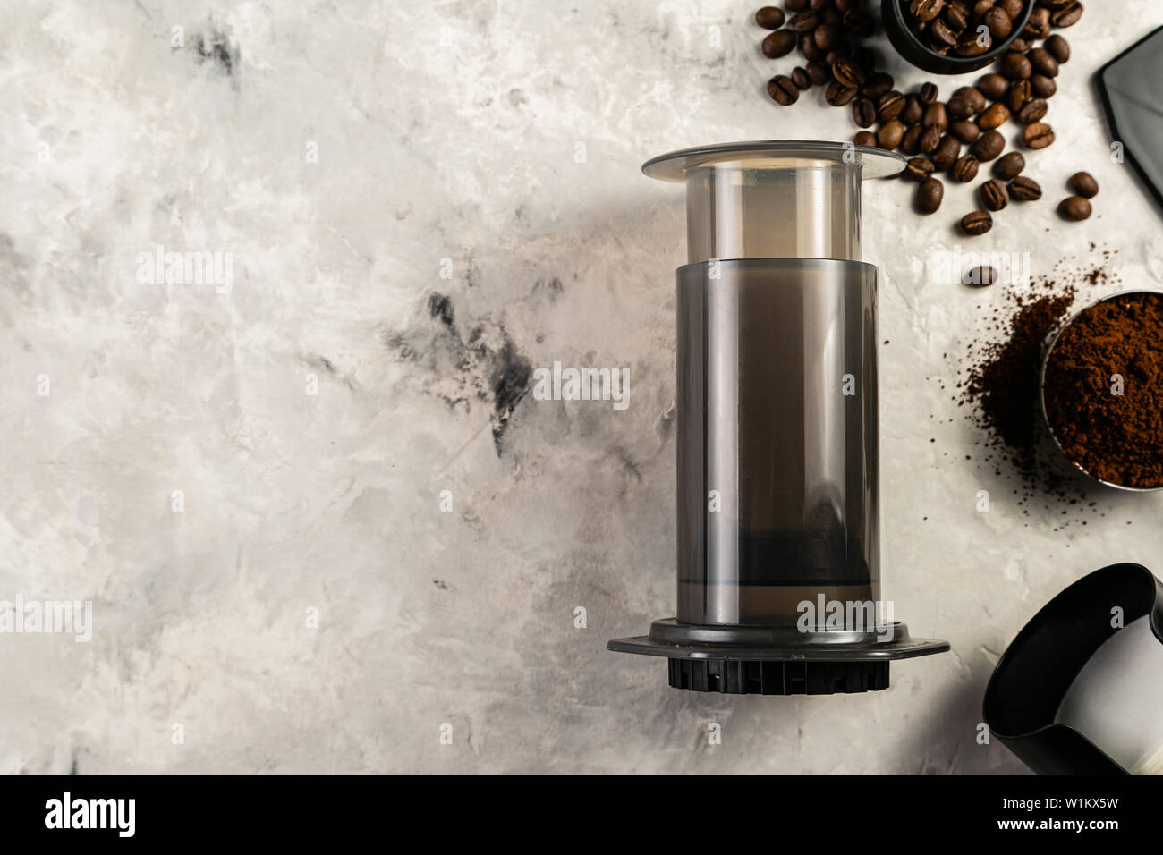 Coffee concept - beans, ground, instant, capsules, marble background ...