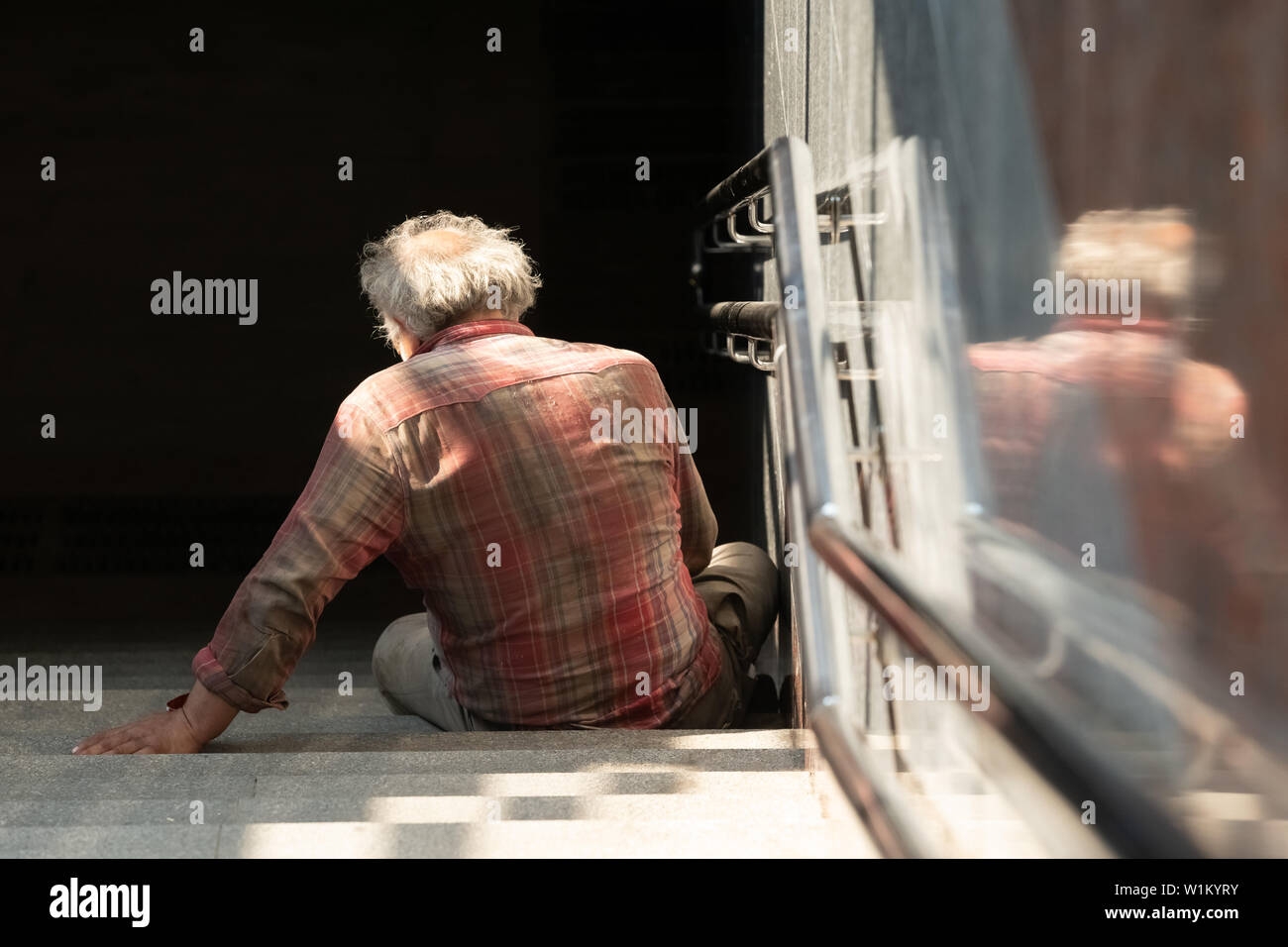 description: Homeless man on walkway street, Homeless concept Stock ...
