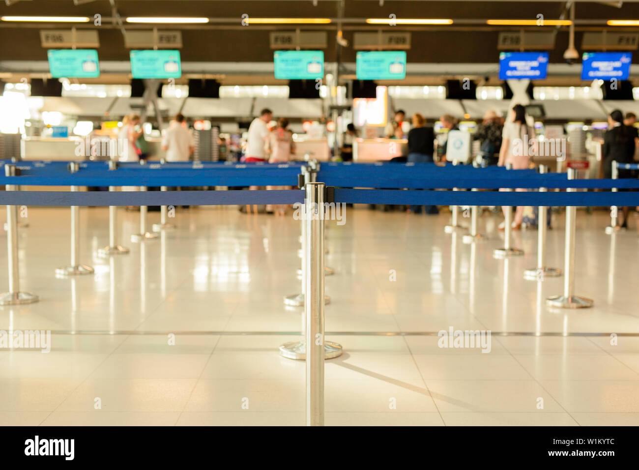 Passengers check-in line at the airport on vacation Stock Photo - Alamy