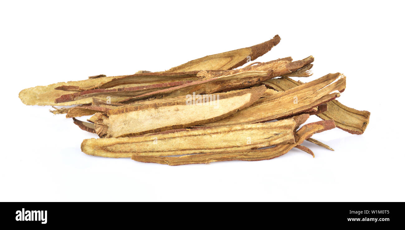 Slice Licorice roots on white background Stock Photo - Alamy