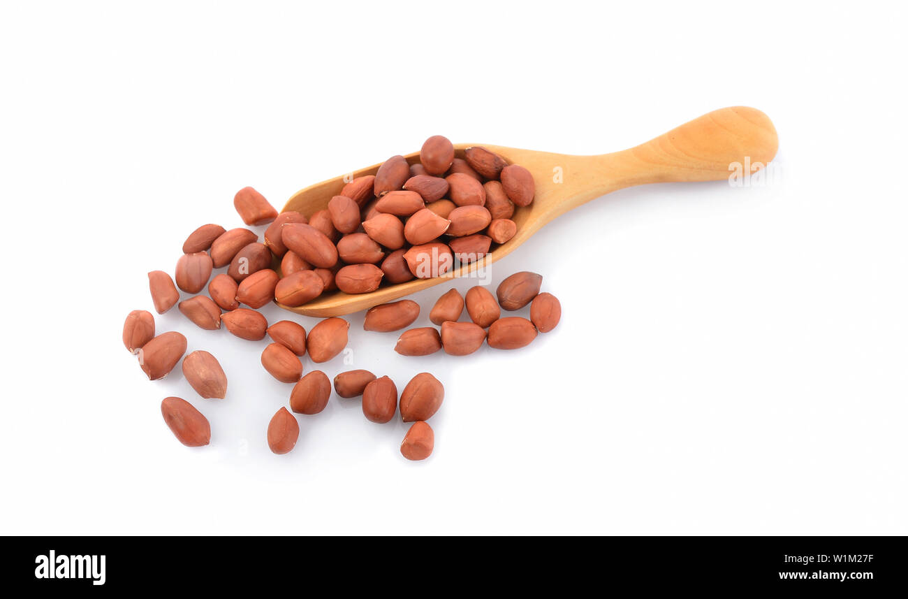 Peanut in Wooden spoon on white background Stock Photo - Alamy