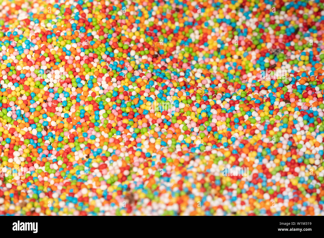 description: Background Rainbow Colored. color sprinkles for baking ...