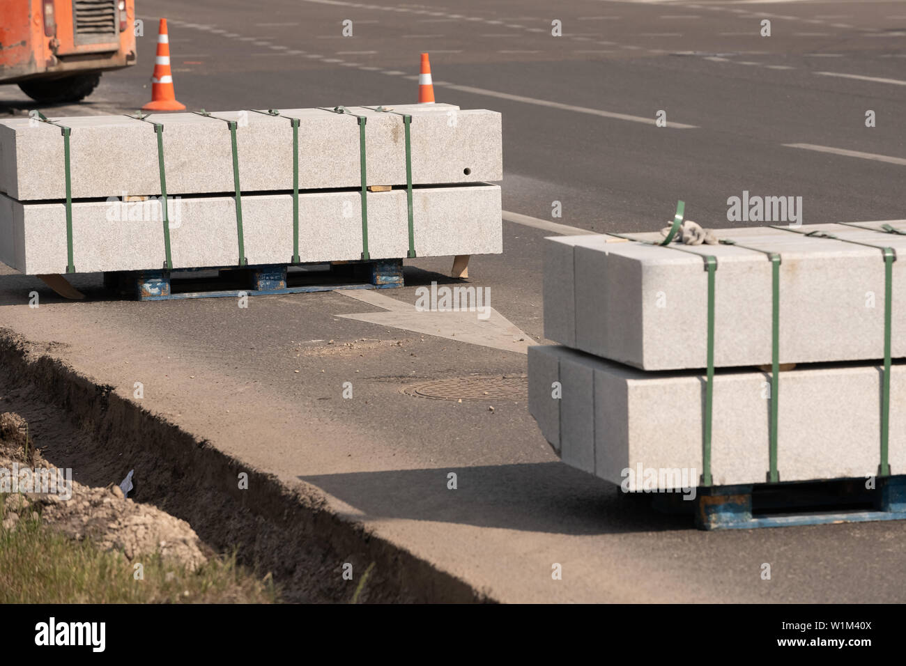 description: Installing pavement curb level and rubber hammers Stock ...