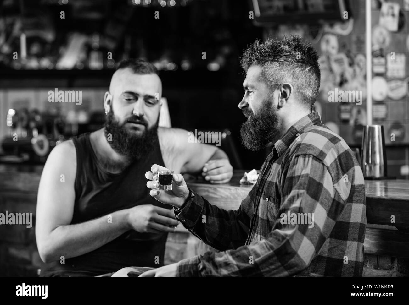 Friday relax in pub. Friends relaxing in pub. Drunk conversation ...