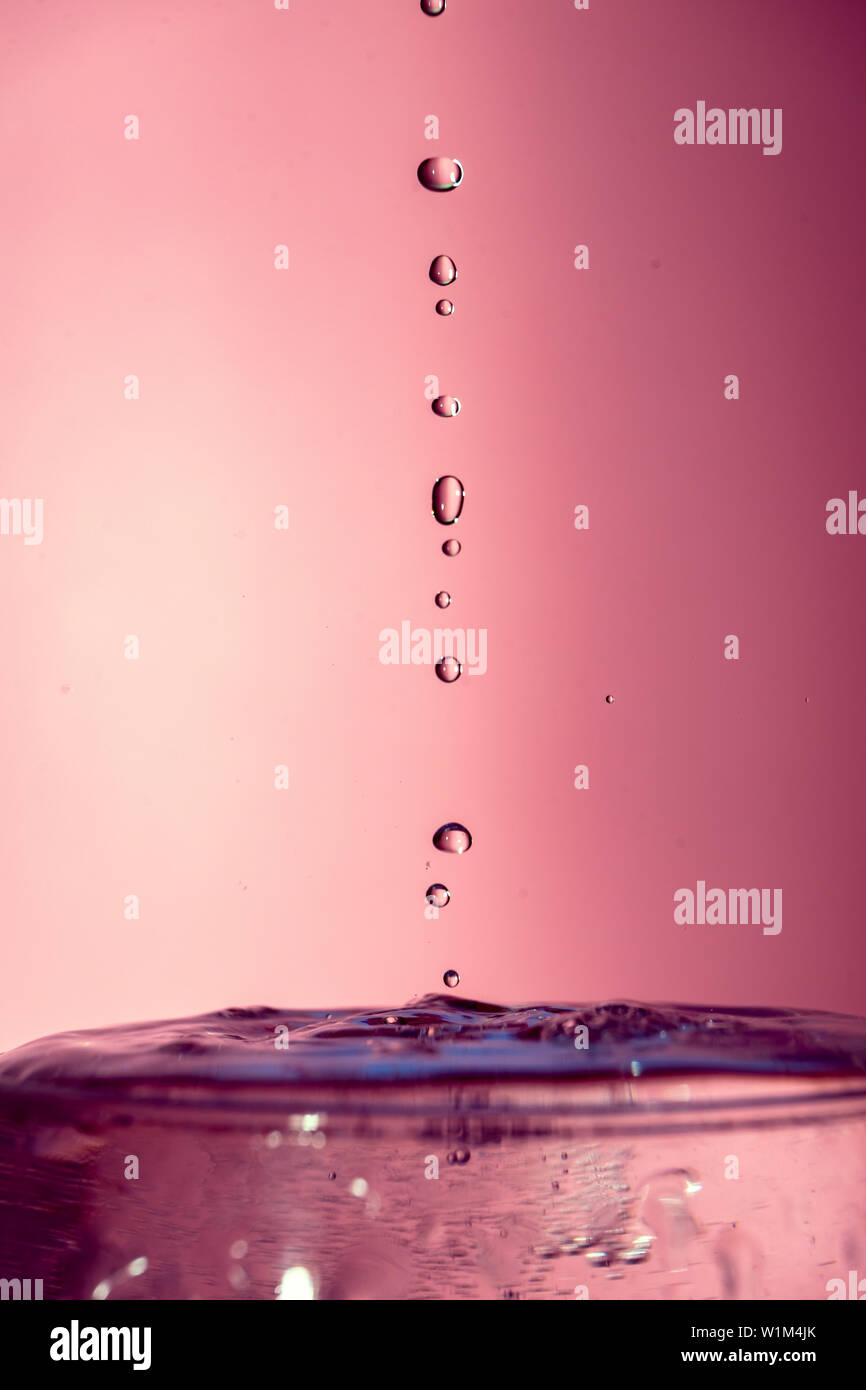 Splash of a water drop Stock Photo - Alamy