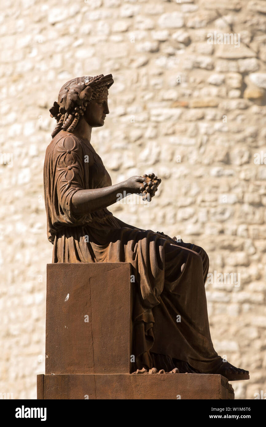 Bronze statue of miss Liberty on the Sault fountain. Provence, Frnace ...