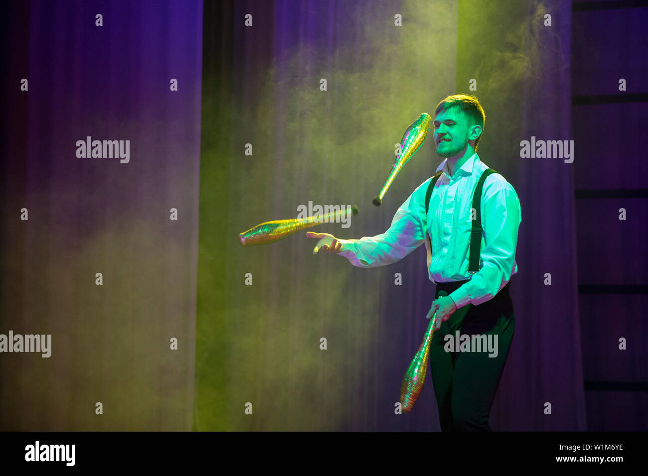 Indicative training circus school.Juggler performing on stage Stock ...