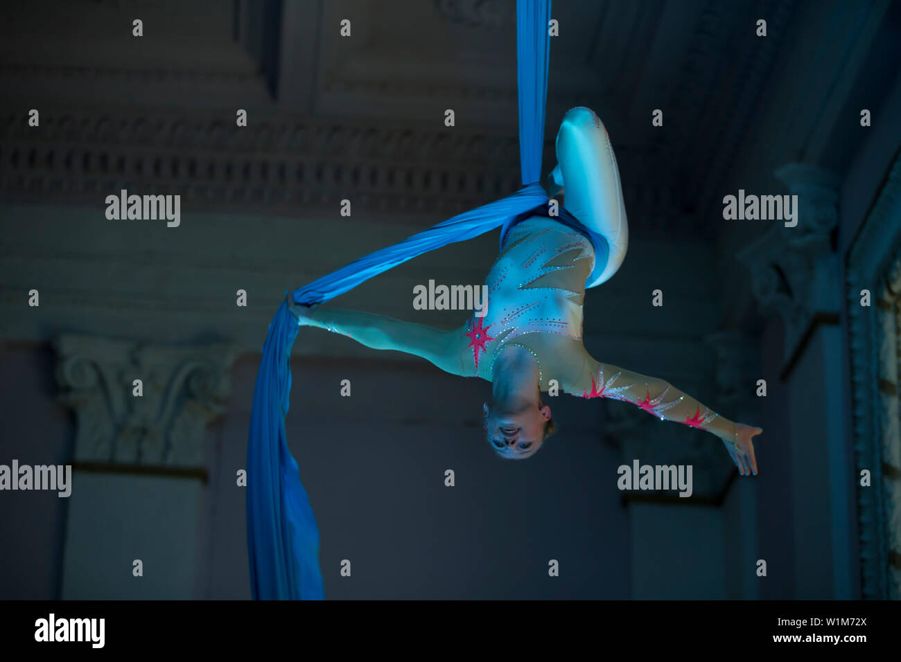 Speech gymnasts on the canvases. Girl on acrobatic canvases.Dangerous ...