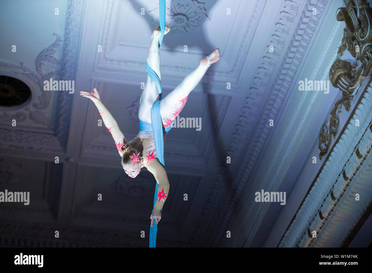 Speech gymnasts on the canvases. Girl on acrobatic canvases.Dangerous ...