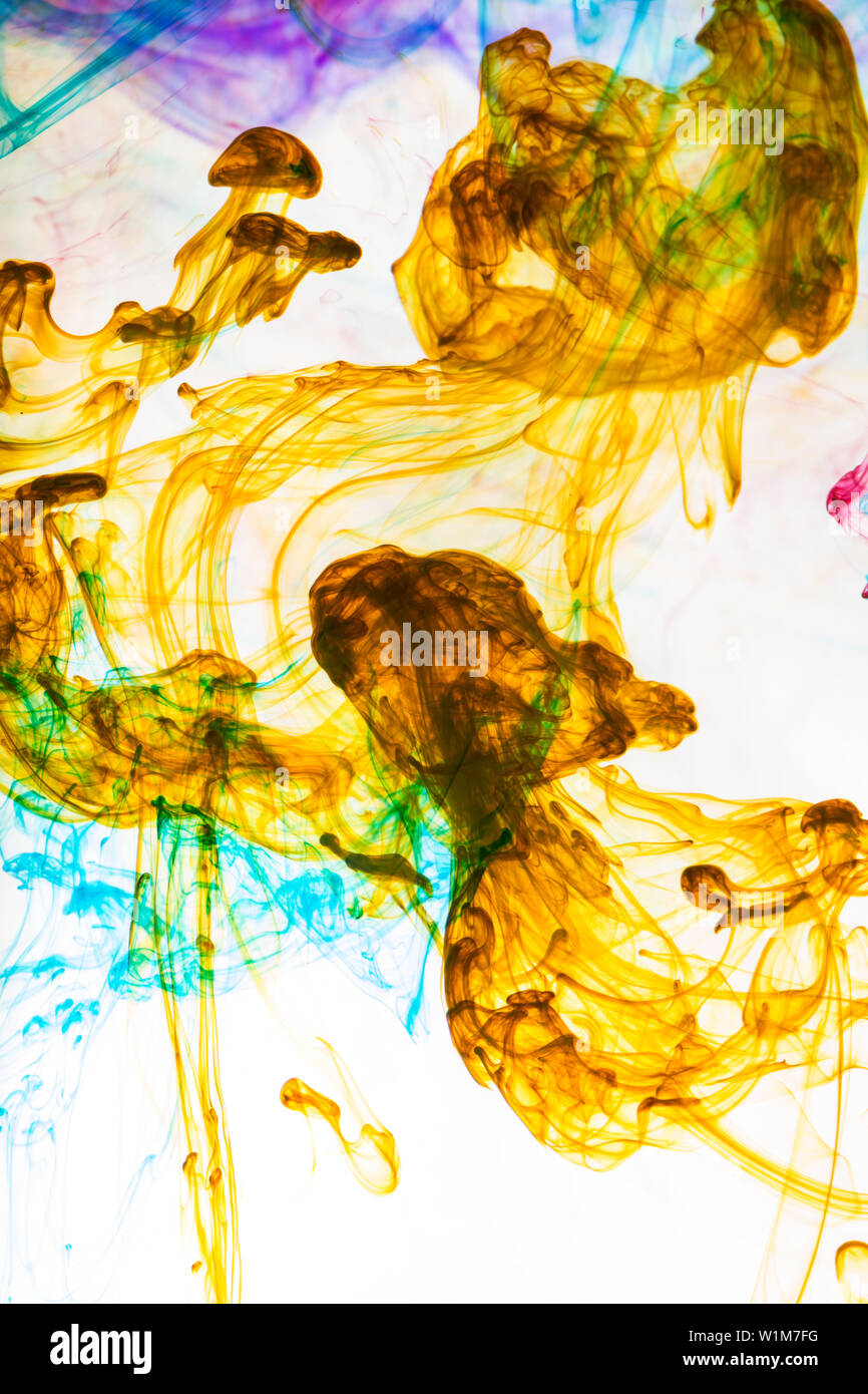 Acrylic colors and ink in water. Abstract background Stock Photo - Alamy