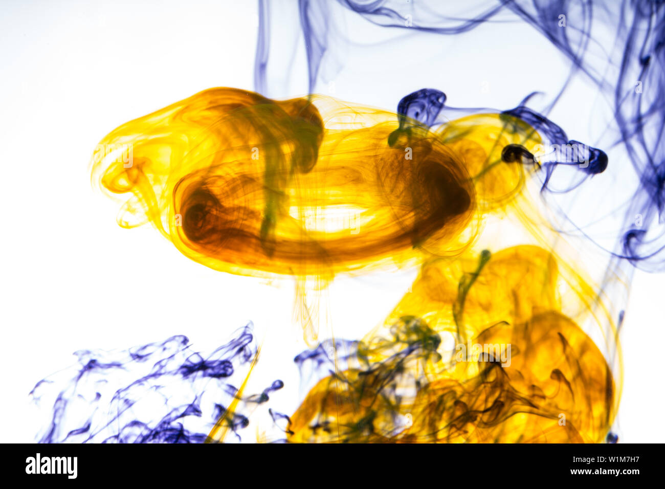 Acrylic colors and ink in water. Abstract background Stock Photo - Alamy