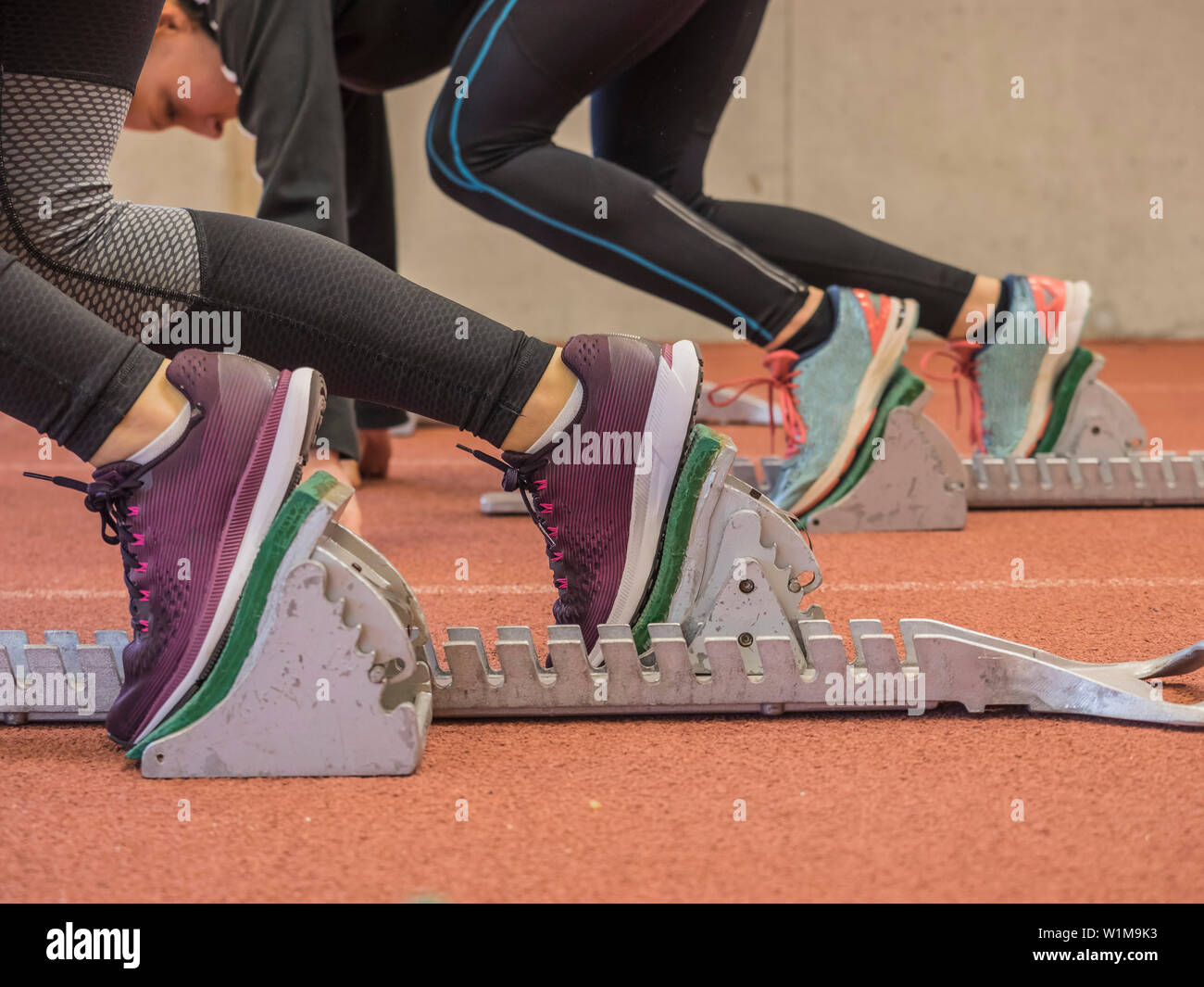 Two runners in starting position hi-res stock photography and images ...