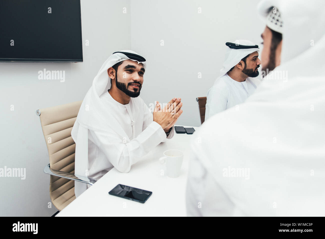 Arabic business team in the office Stock Photo - Alamy
