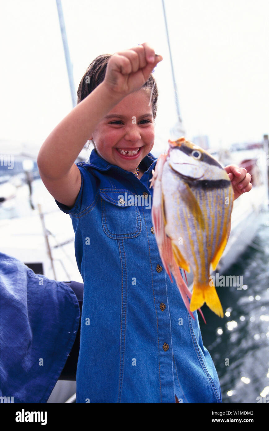Girl 6 years, &Fresh fish, Miami, Florida, USA Children, People Stock ...