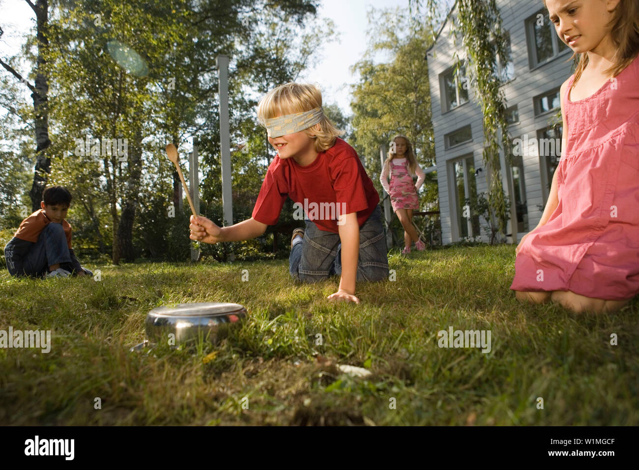 Children playing Hit the Pot, children's birthday party Stock Photo - Alamy