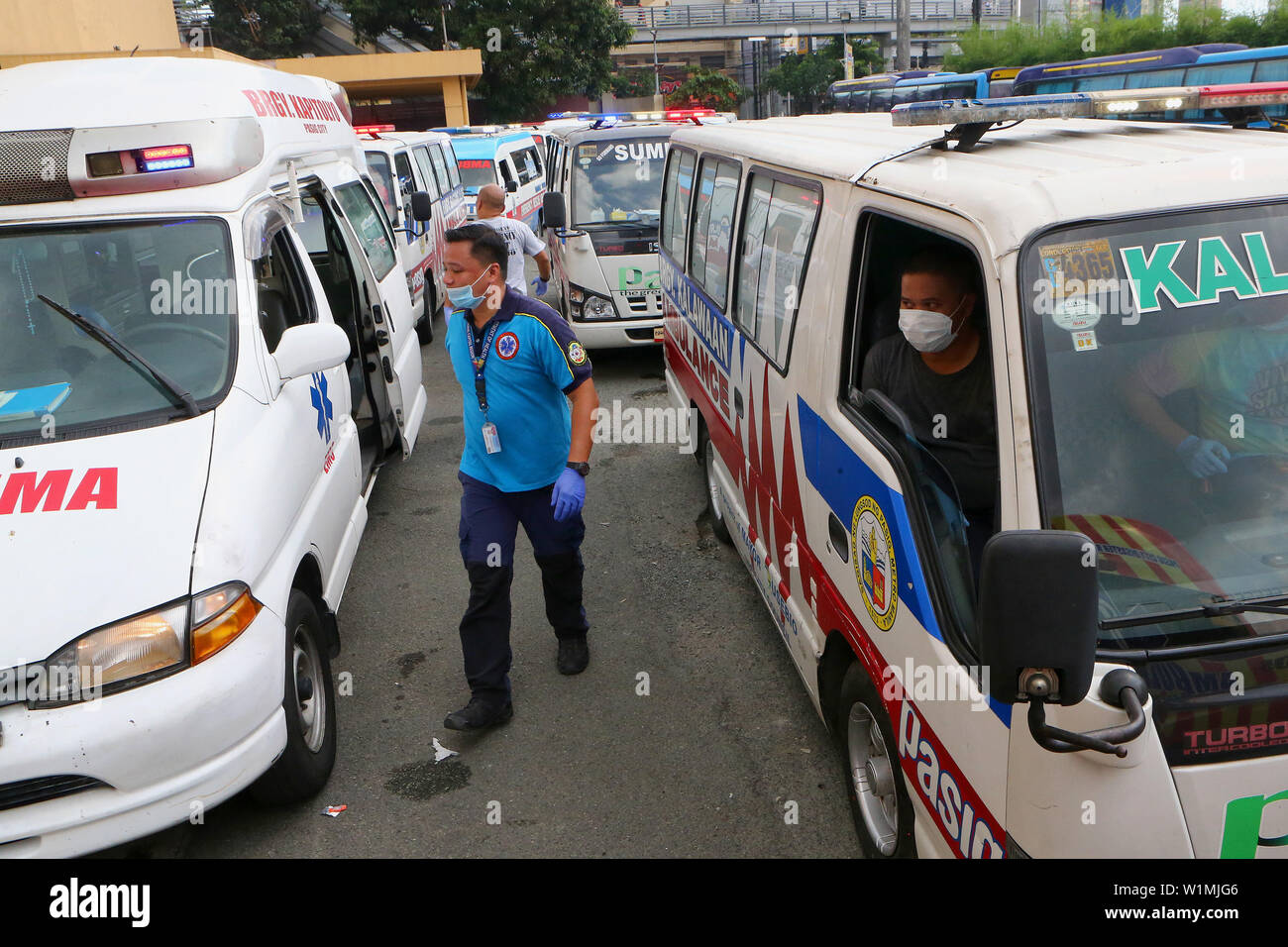 Pasig, Philippines. 3rd July, 2019. Ambulances line up to respond to ...