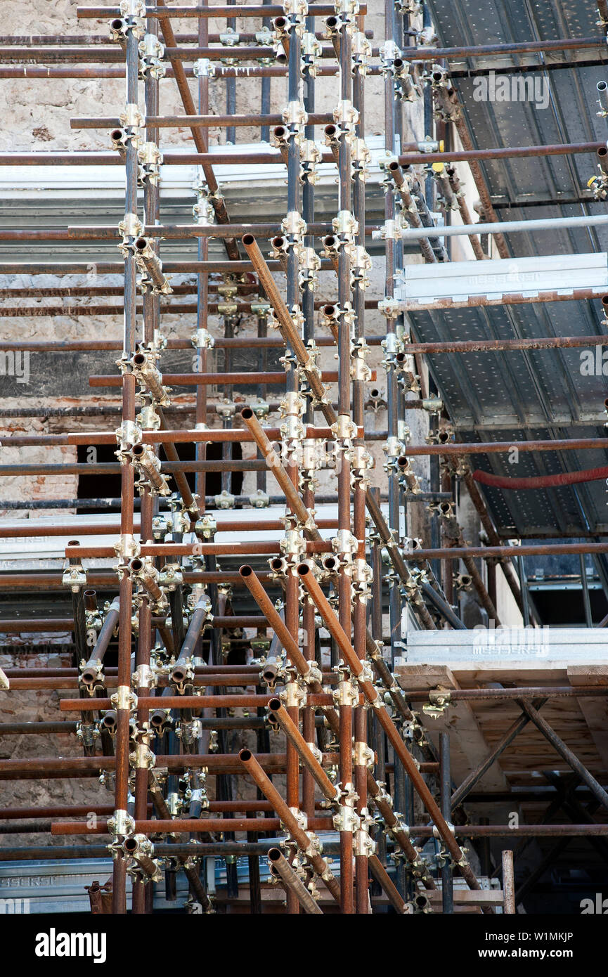 Scaffolding supports a house in the earthquake damaged historic centre ...