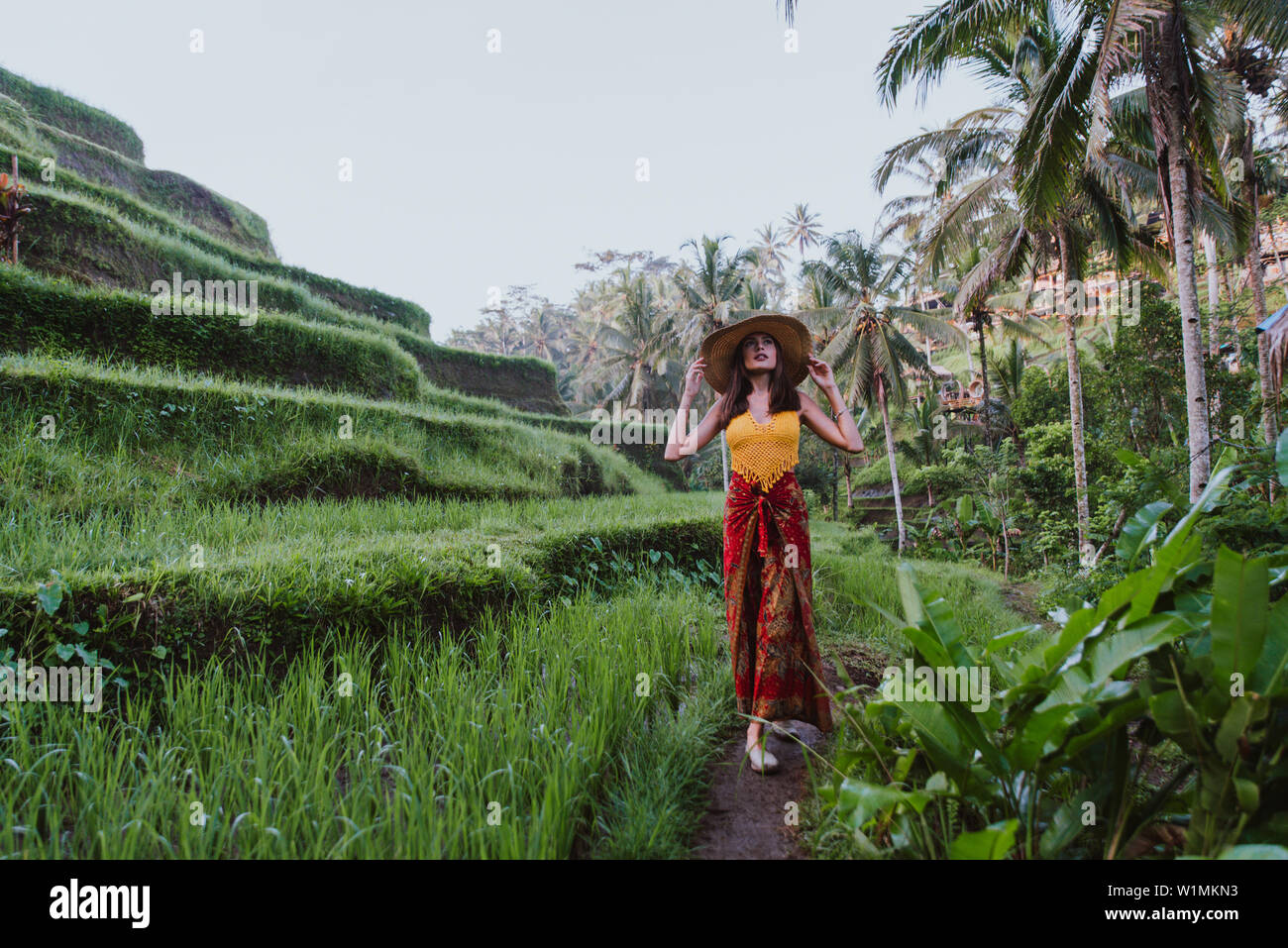Beautiful girl visiting the Bali rice fields in tegalalang, ubud ...