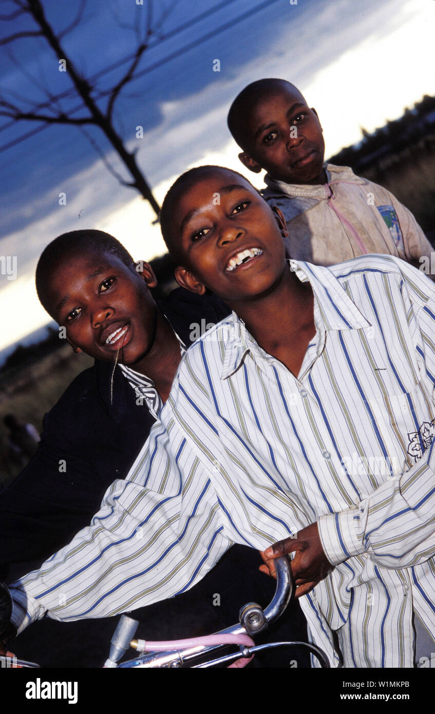 Black boys on bike hi-res stock photography and images - Alamy