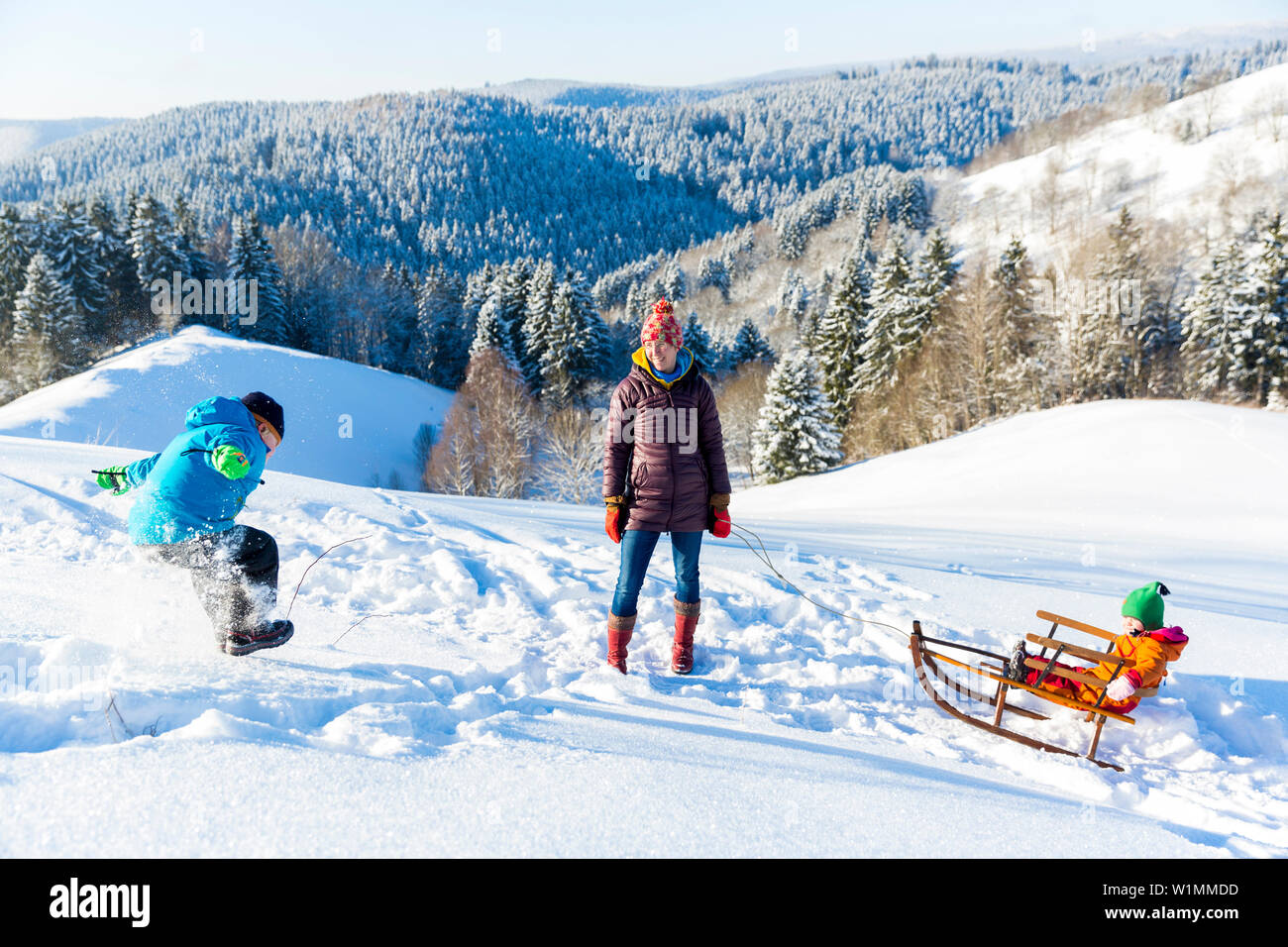 Boy pulling sledge hi-res stock photography and images - Alamy