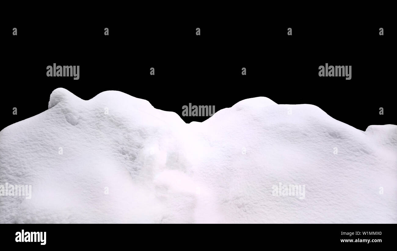 white snow drift isolated on black background Stock Photo - Alamy