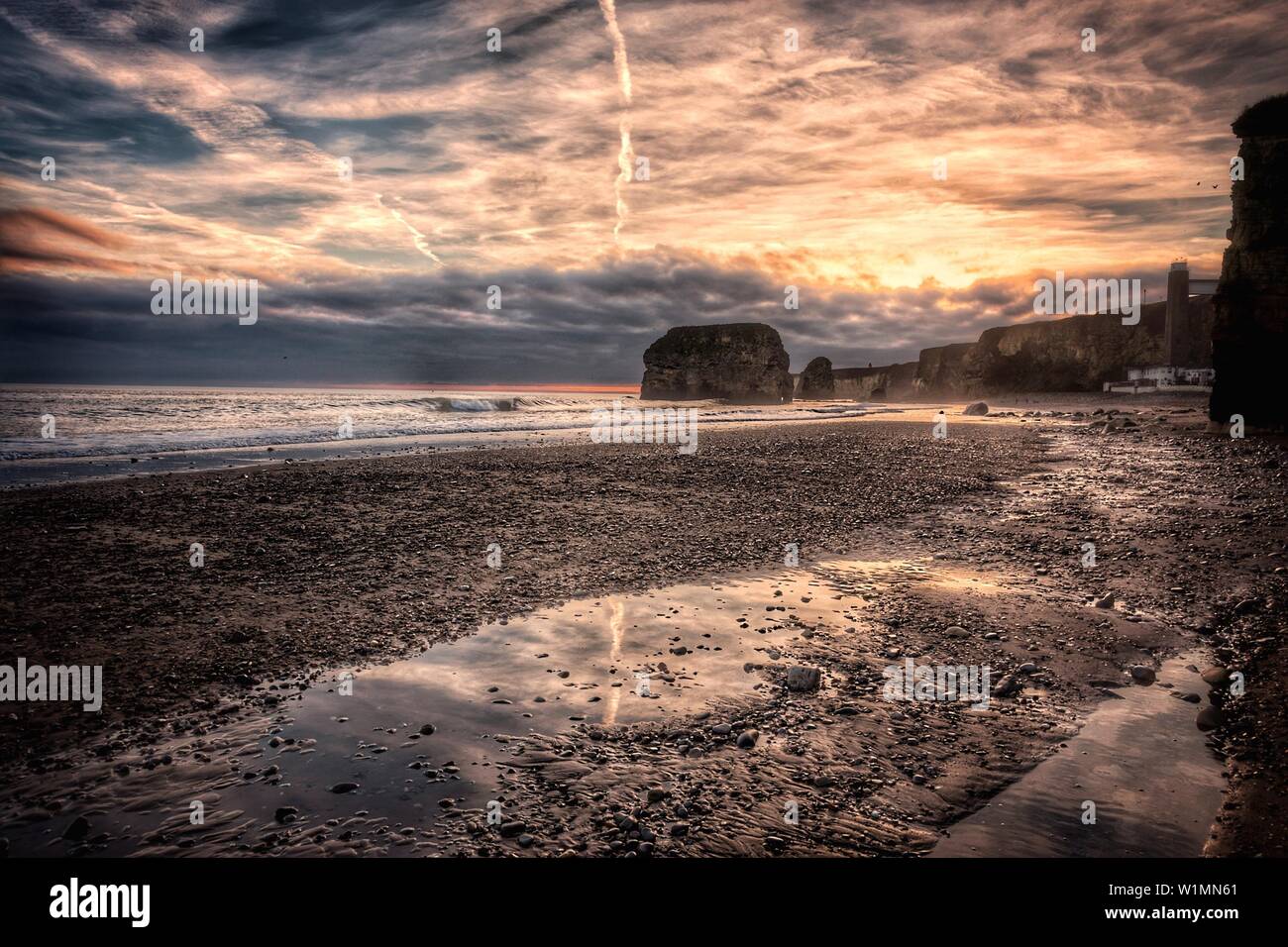 sea dawn sunset water seashore Stock Photo - Alamy