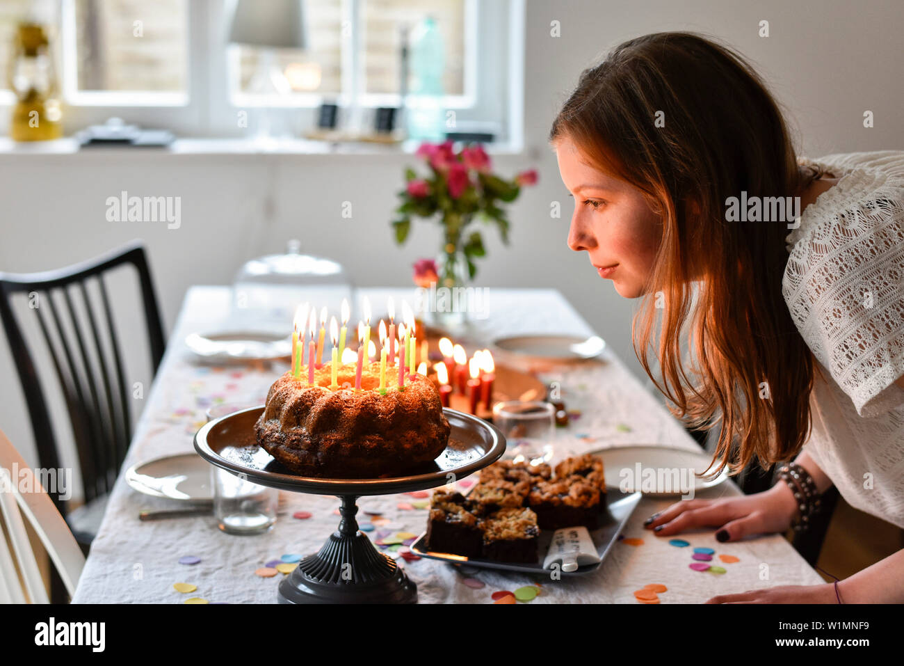 Blowing out candles hi-res stock photography and images - Alamy