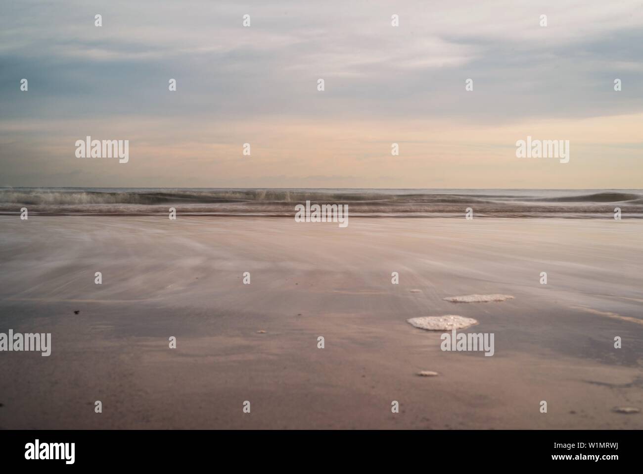 beach sunset sand seashore landscape Stock Photo - Alamy