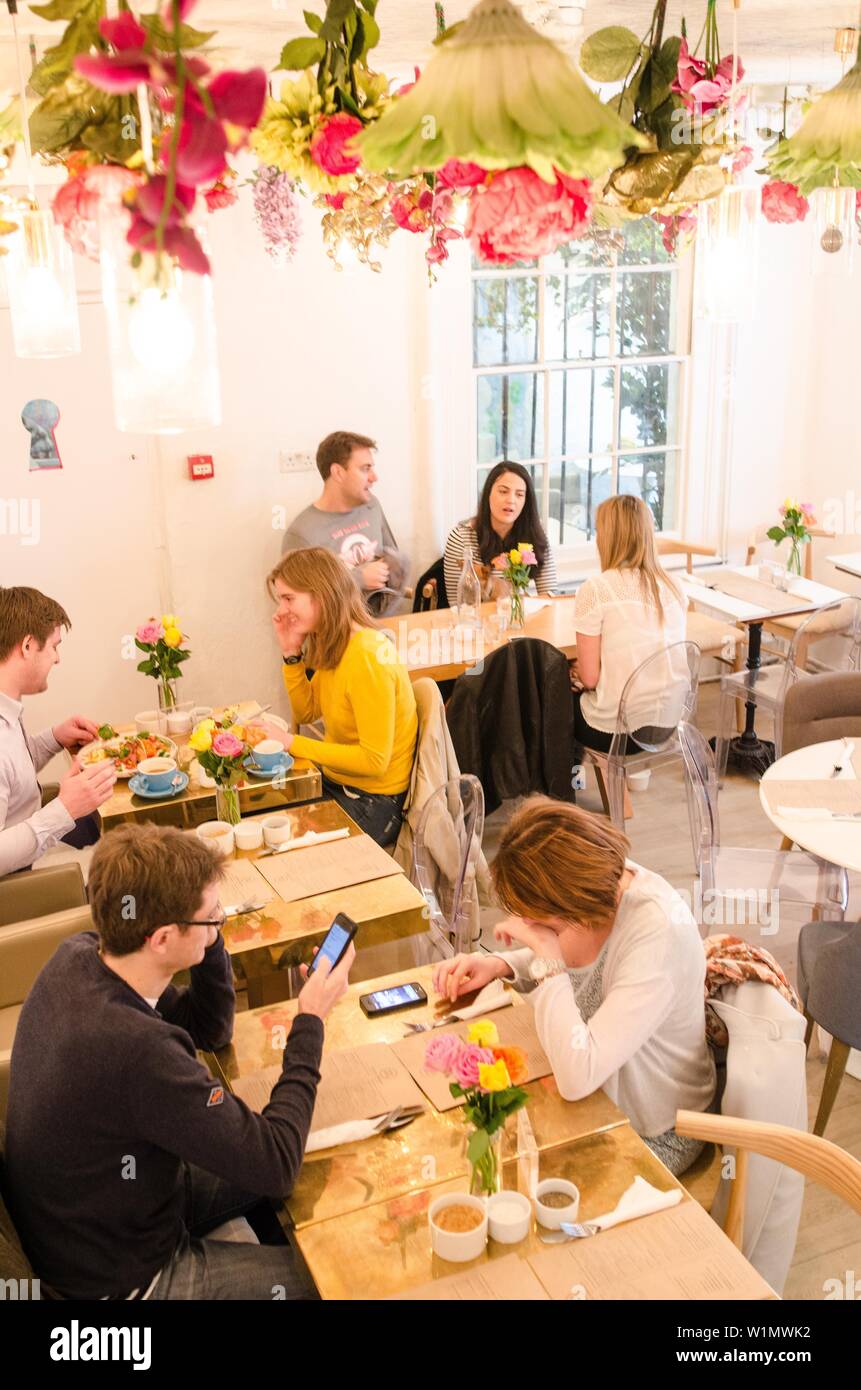 togetherness sit people indoors man Stock Photo - Alamy