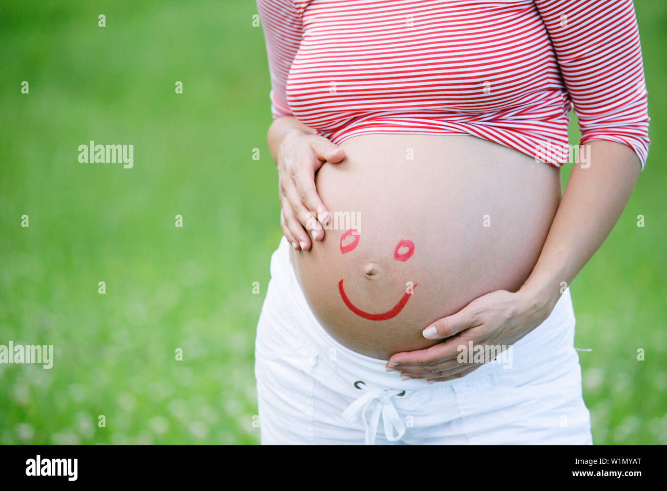 Smiley Face On Stomach High Resolution Stock Photography and Images - Alamy