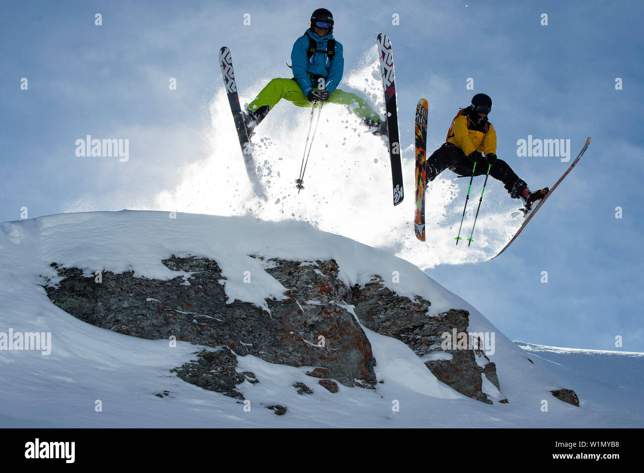 Two skiers jumping hi-res stock photography and images - Alamy