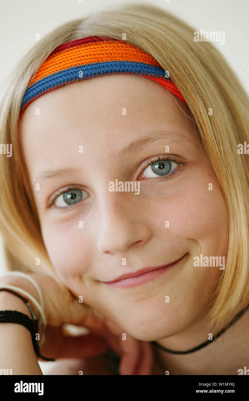 Girl (12 years) smiling at camera Stock Photo - Alamy