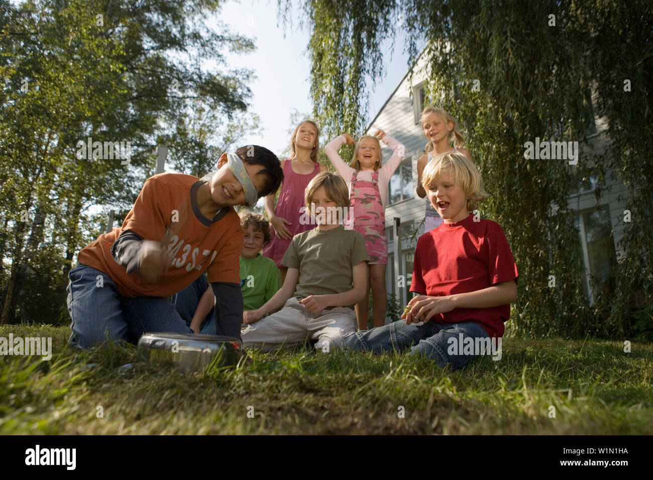 Children playing Hit the Pot, children's birthday party Stock Photo - Alamy