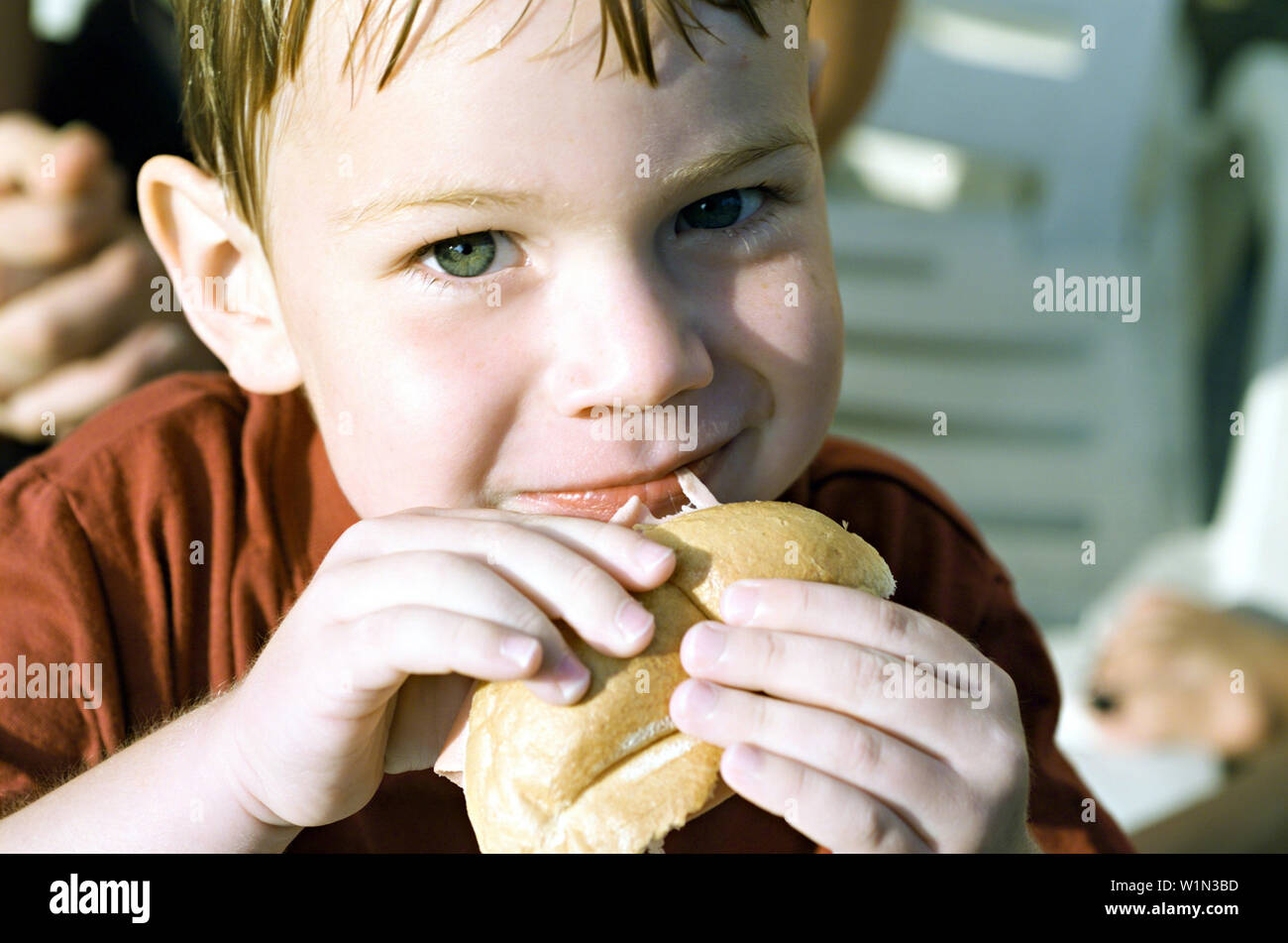 Eating child, people boy eating Stock Photo - Alamy