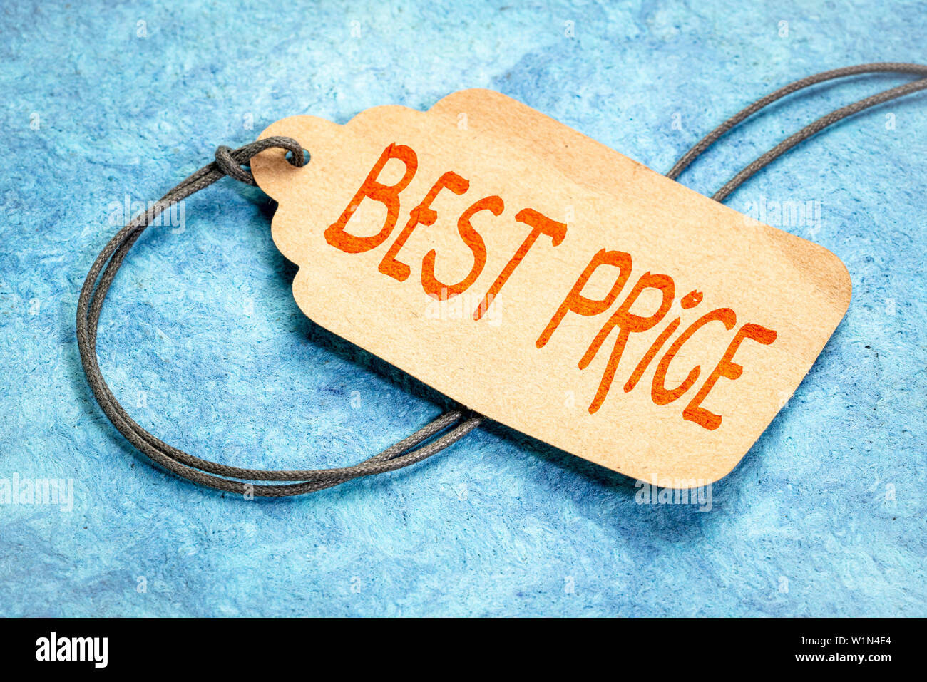 best price sign, marketing concept - handwriting on a paper price tag ...
