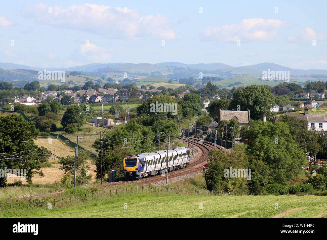 New Northern Rail Civity diesel multiple-unit train rounding curve on ...