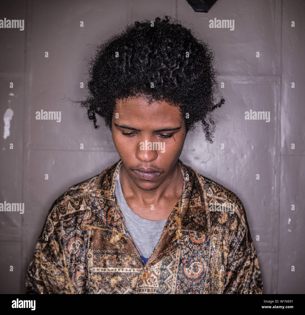 Depressed sad african man alone hi-res stock photography and images - Alamy