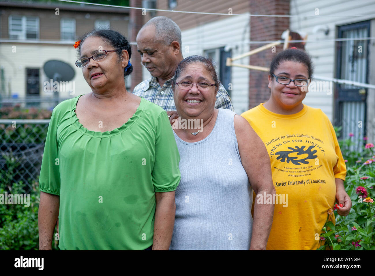 a Hispanic family in the garden in their backyard in Philadelphia Stock ...