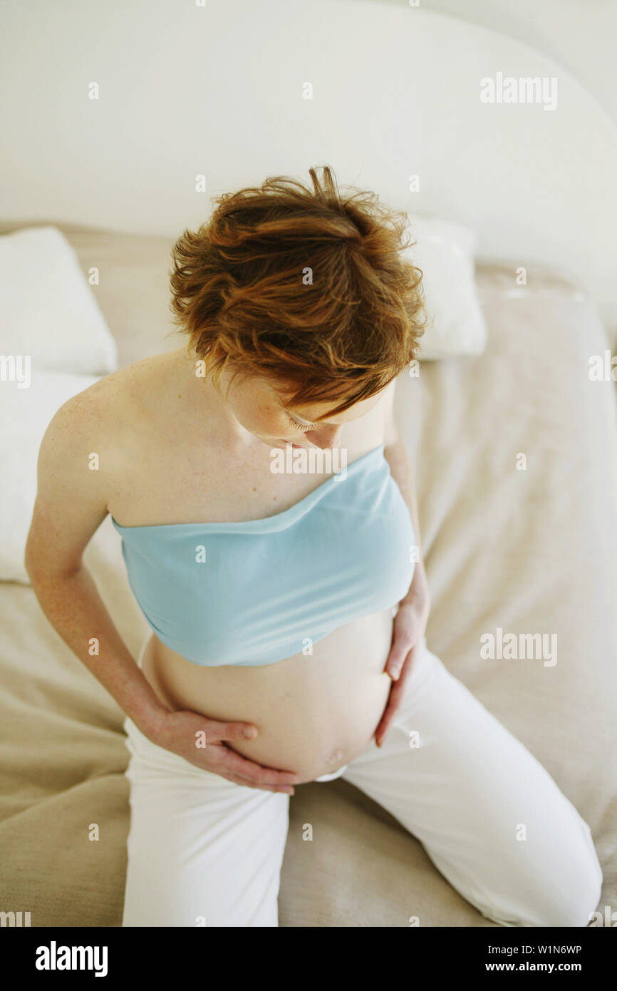 Pregnant girl, Wellness Stock Photo - Alamy